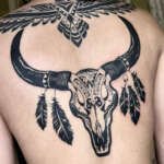 Top 26 Elegant and Badass Skull Back Tattoo Designs for Men